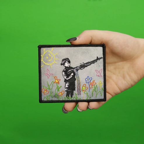 Banksy Crayon Shooter Embroidered Iron On PhotoPatch – Patch Collection